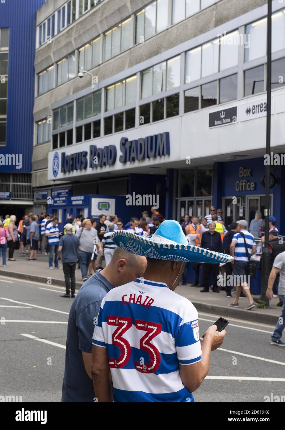 QPR fans arrive at Loftus Road Stock Photo - Alamy
