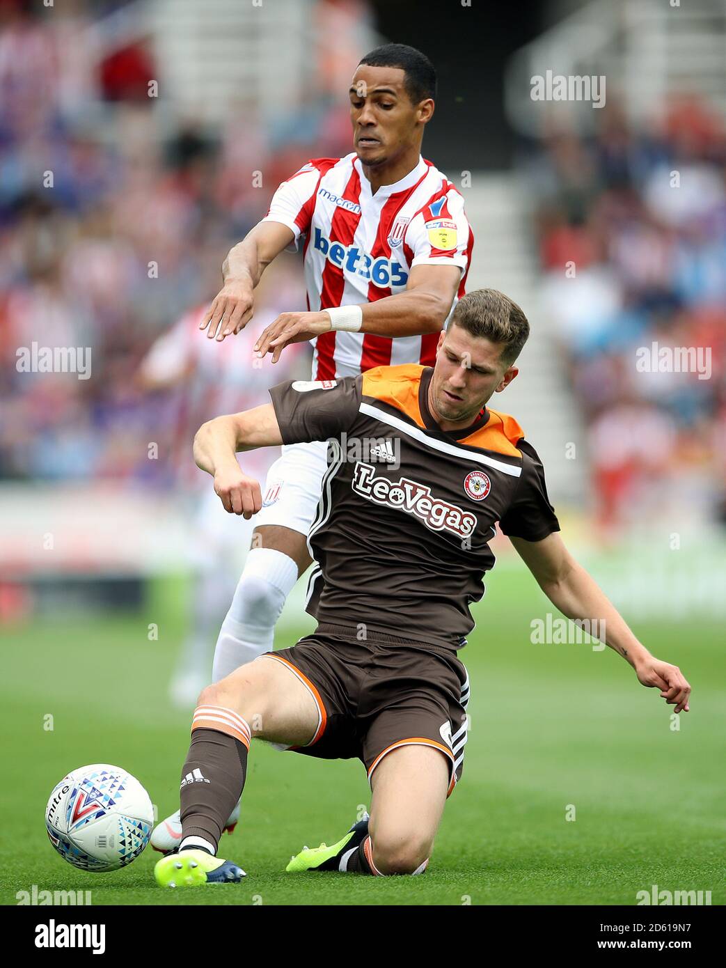 Stoke City's Tom Ince (left) and Brentford's Chris Mepham (right ...
