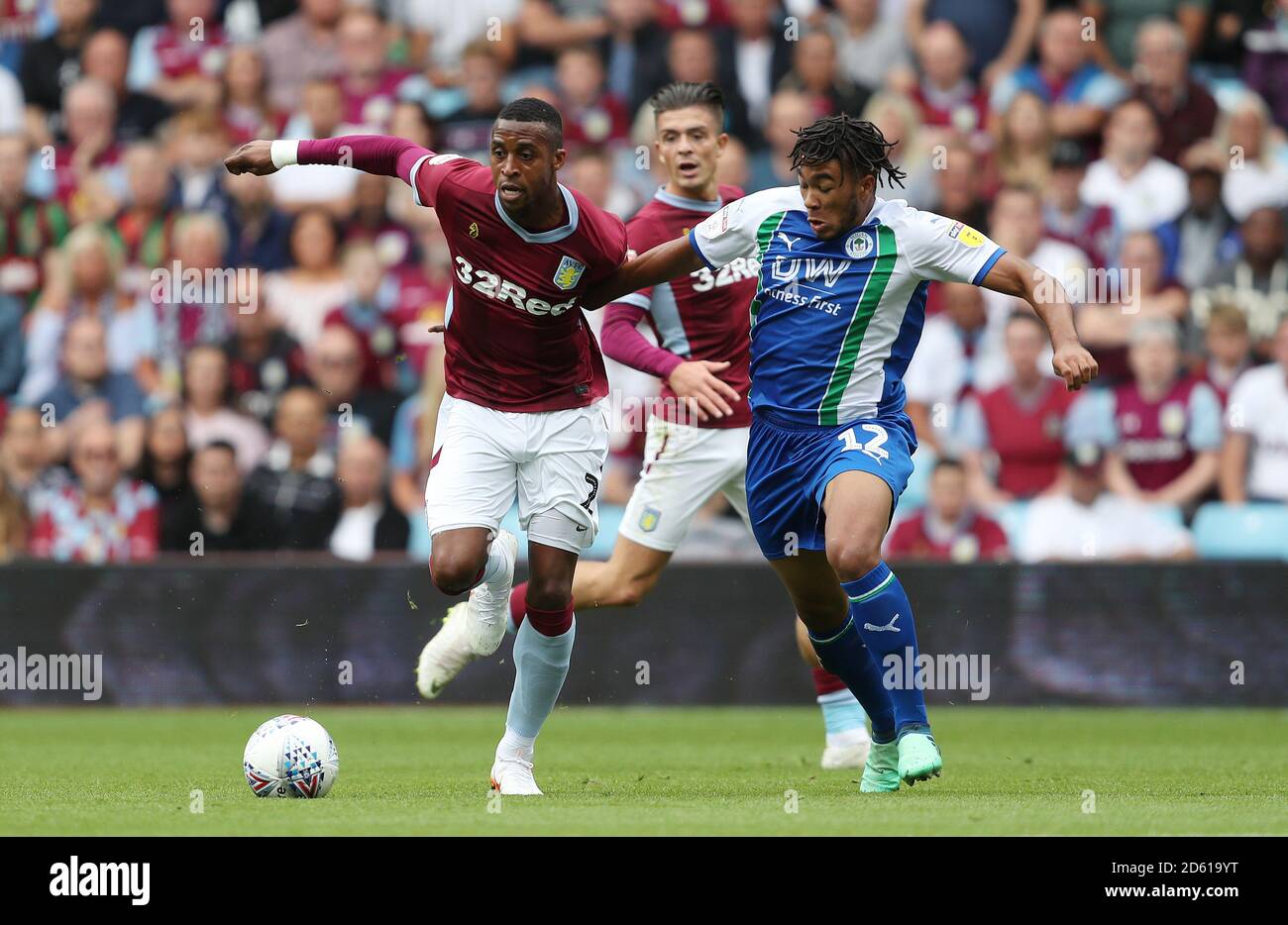 Aston Villa's Jonathan Kodjia and Wigan Athletic's Reece James Stock ...