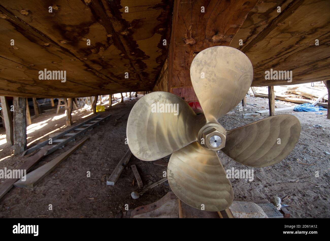A view of the propeller of a traditional wooden Dhow.Oman has a long ...