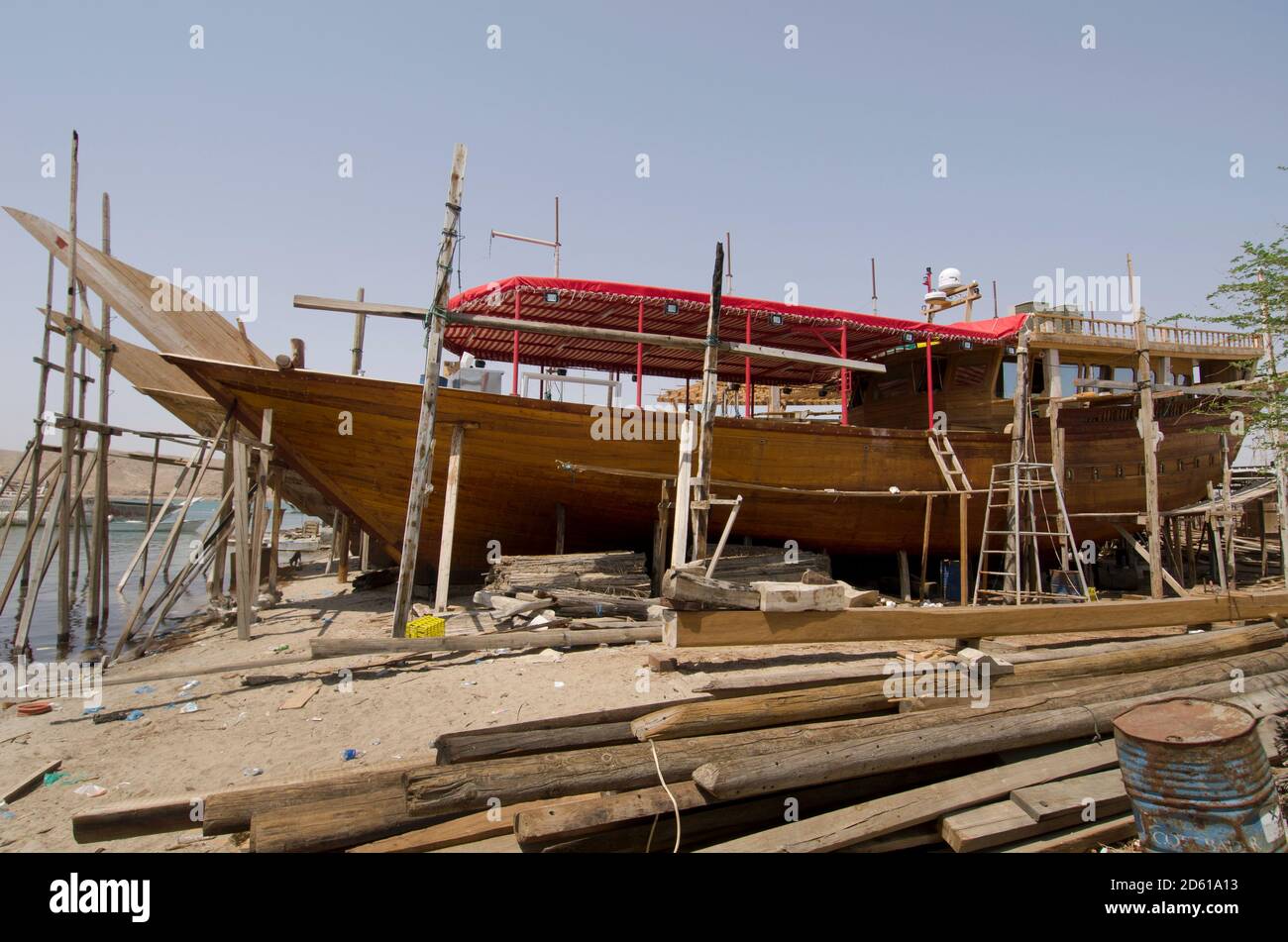 A view of the traditional wooden Dhow building yard at the port of Sur ...