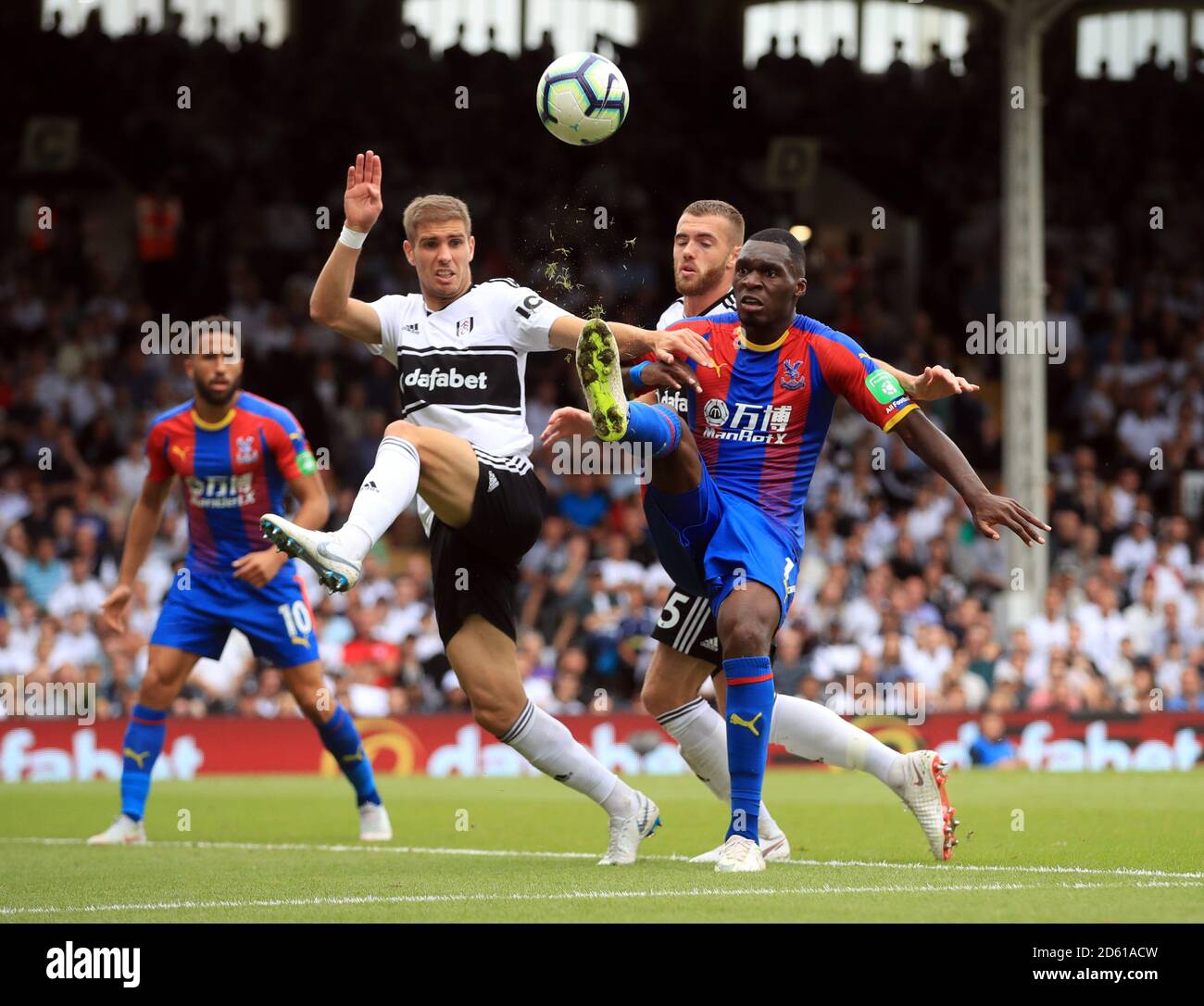Fulham's Maxime Le Marchand and Crystal Palace's Christian Benteke ...