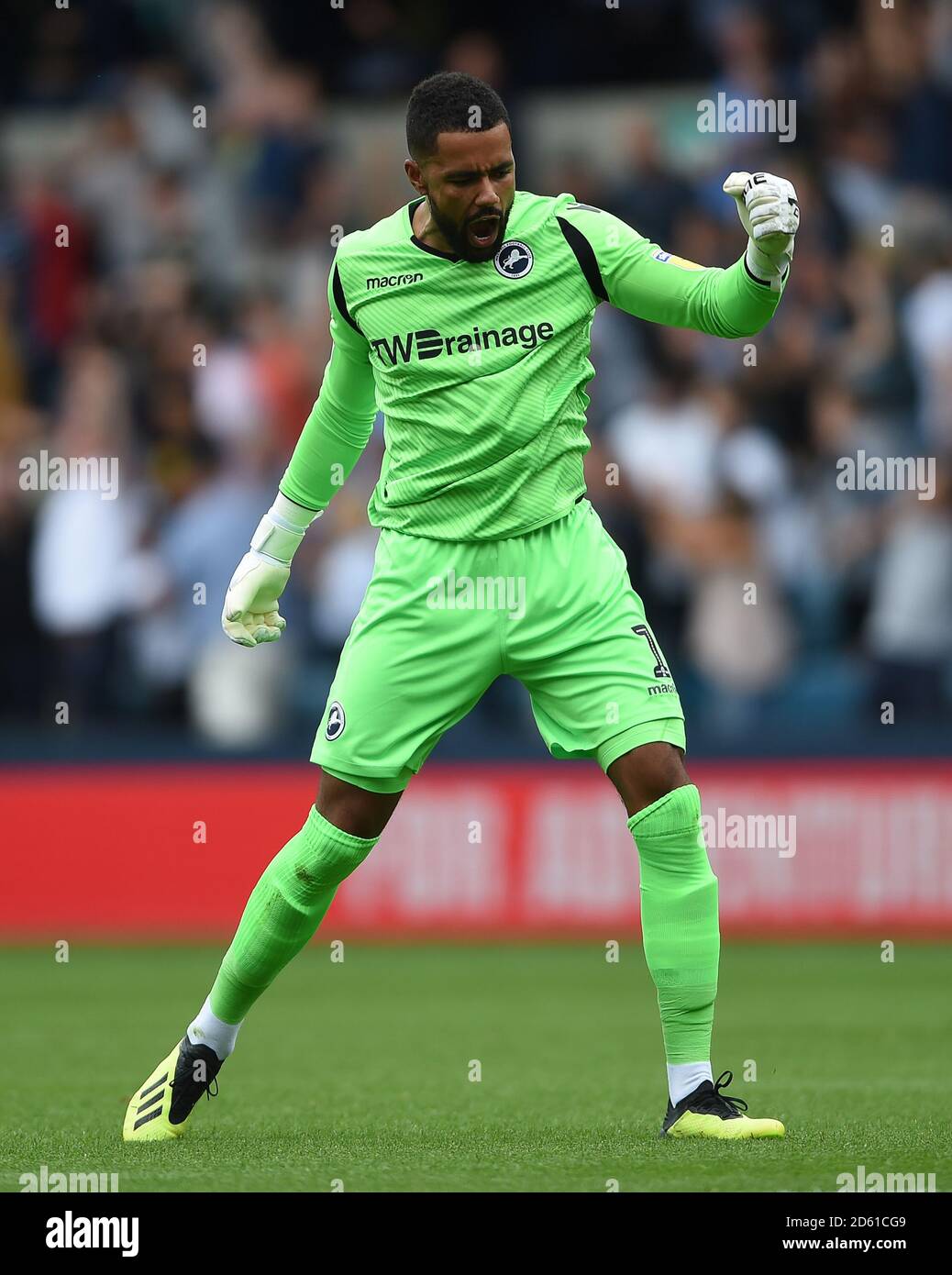 Millwall goalkeeper Jordan Archer celebrates as his side score their ...