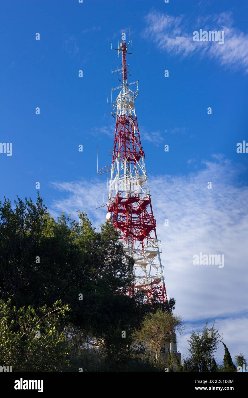 Telecommunications tower with clear blue sky Stock Photo - Alamy
