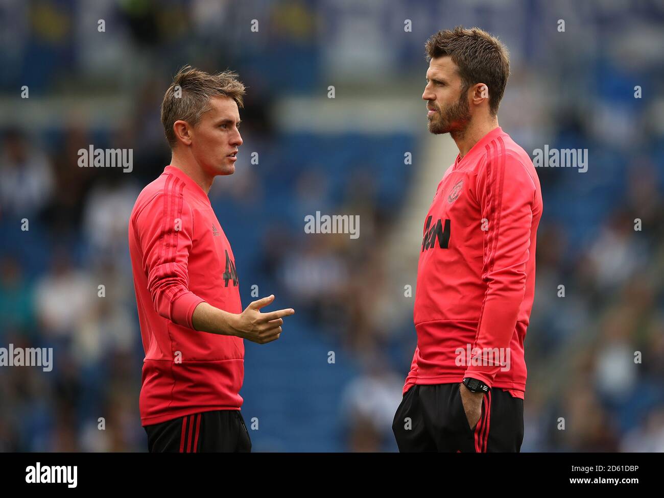 Manchester United coach Kieran McKenna (left) and coach Michael Carrick ...