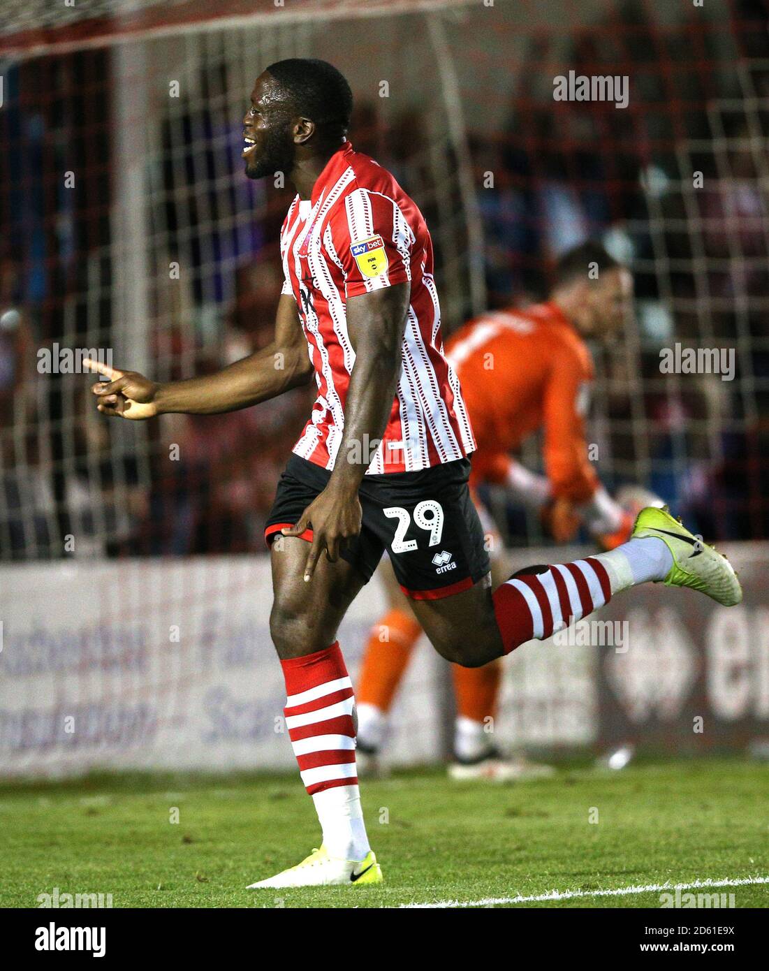 Lincoln citys john akinde celebrates scoring hi-res stock photography ...
