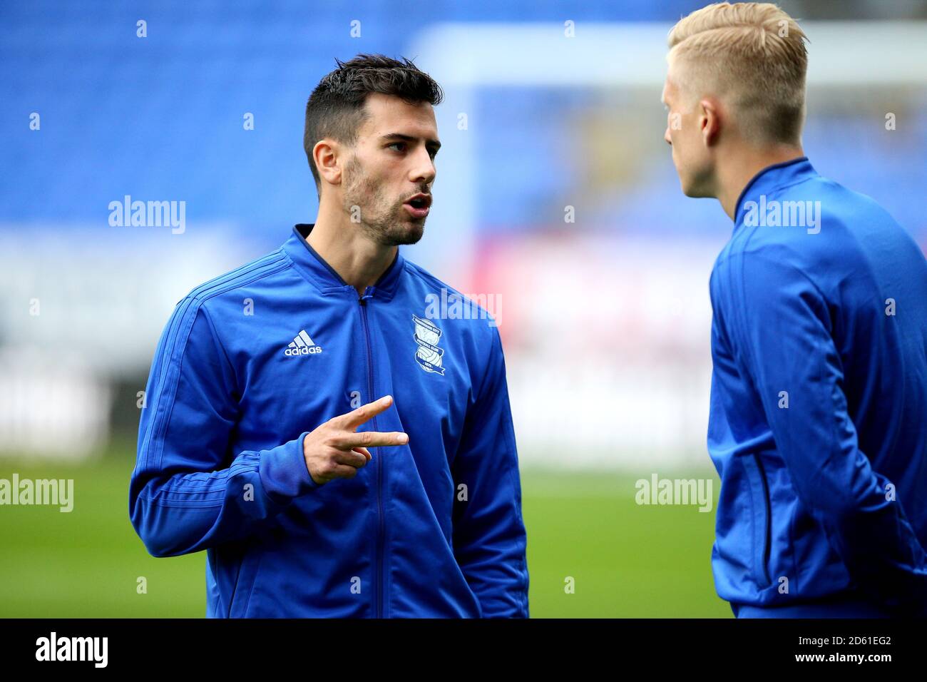 Birmingham City's Maxime Colin (left) inspects the pitch prior to the ...