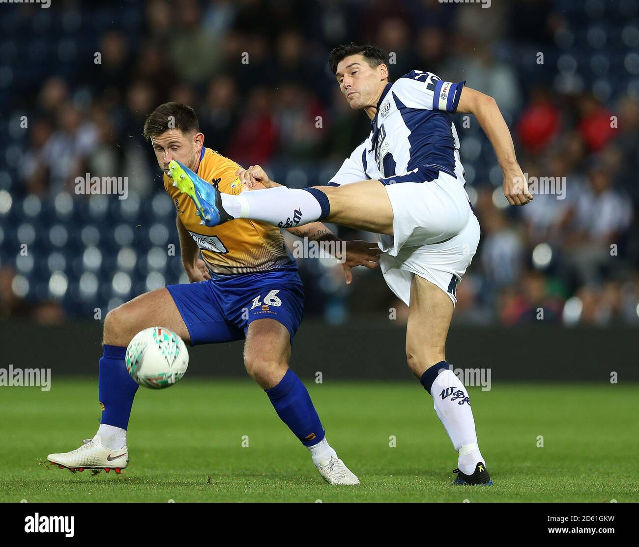 West Bromwich Albion's Gareth Barry and Mansfield Town's Callum Butcher ...