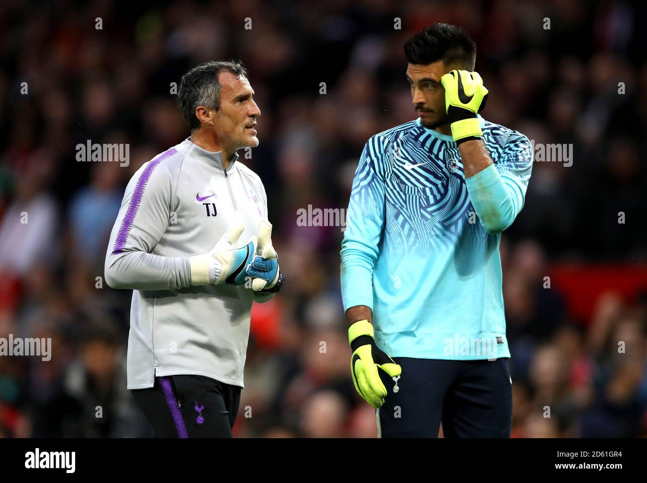 Tottenham Hotspur goalkeeping coach Toni Jimenez speaks with goalkeeper ...