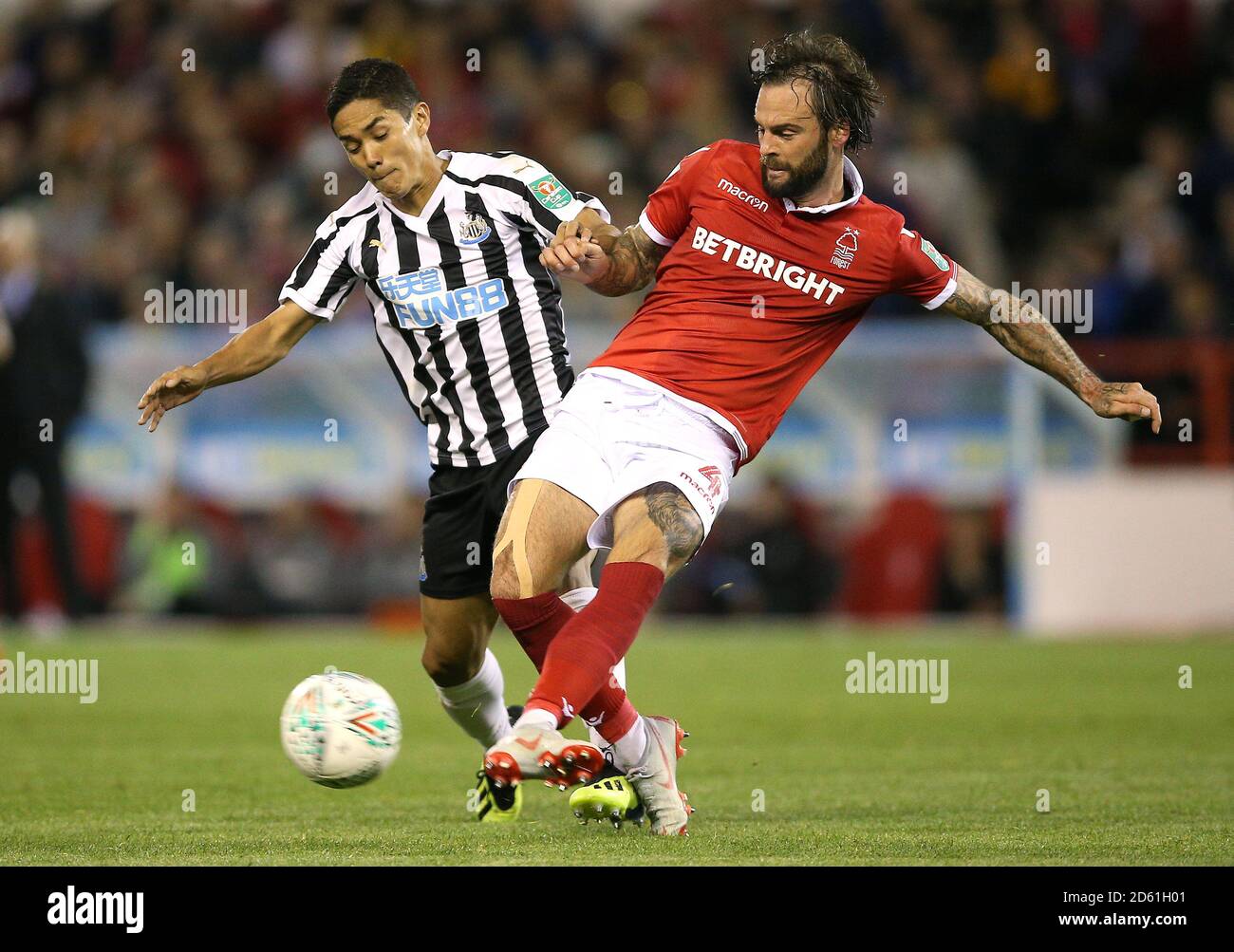 Newcastle United's Yoshinori Muto (left) and Nottingham Forest's Danny ...