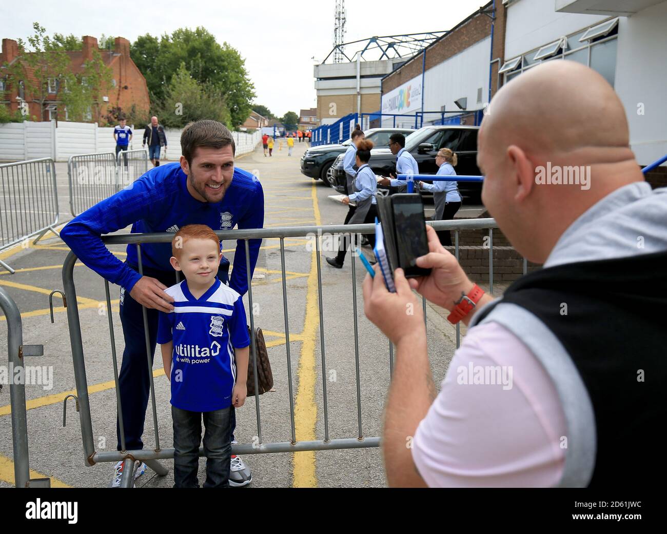 Birmingham City's Gary Gardner poses for photograph with a young fan ...