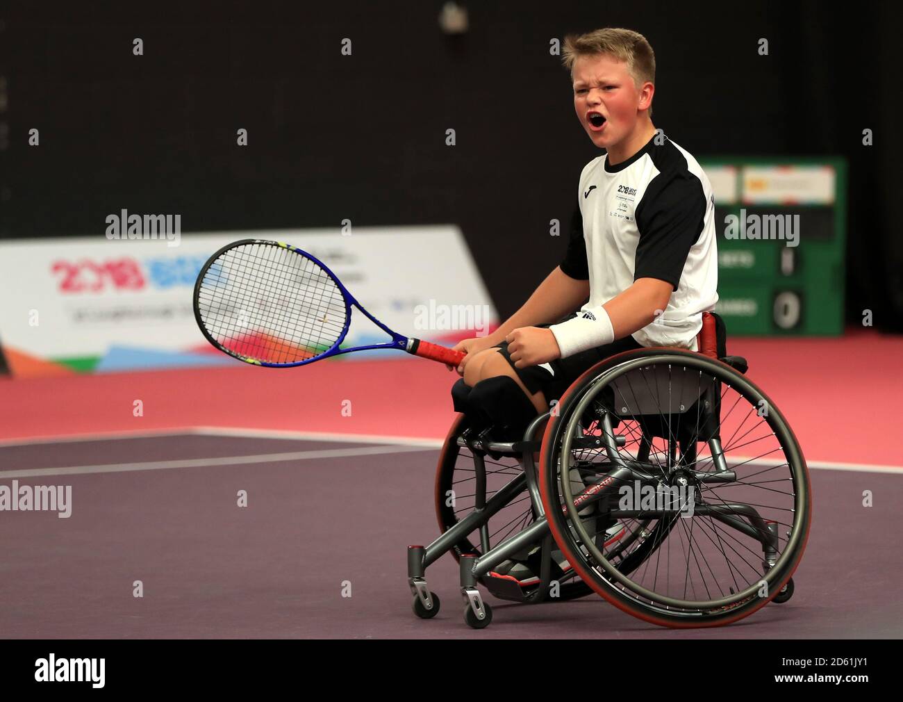 England's Ben Bartram reacts after winning his match during the ...