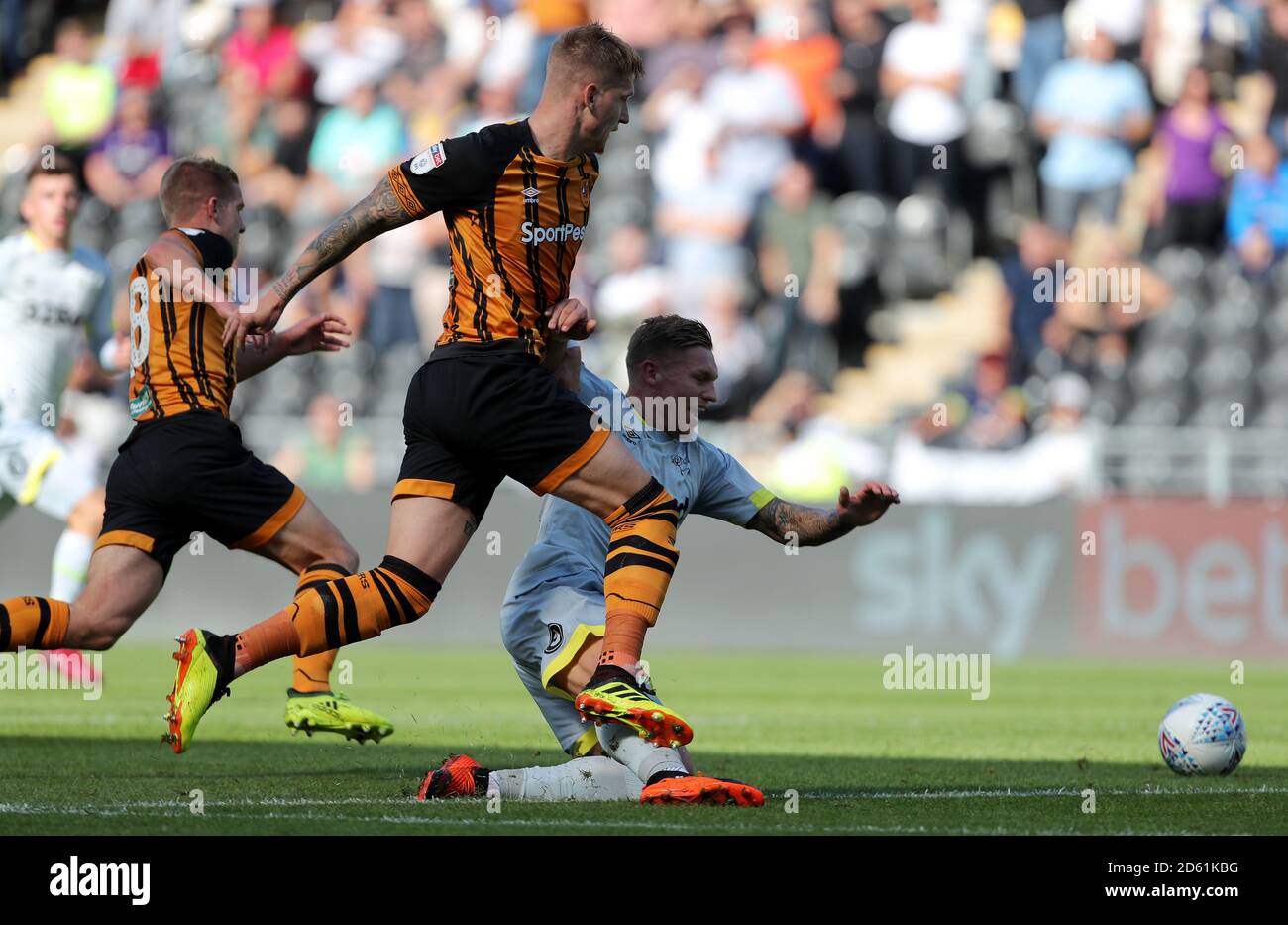 Hull City's Jordy de Wijs (left) fouls Derby County's Martyn Waghorn ...