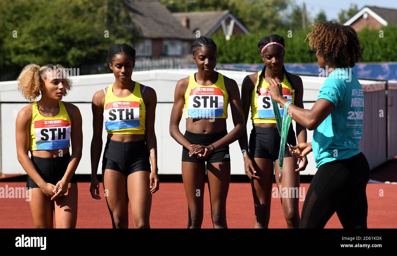 Team South receive silver medals in the girls 4x100 relay during day ...