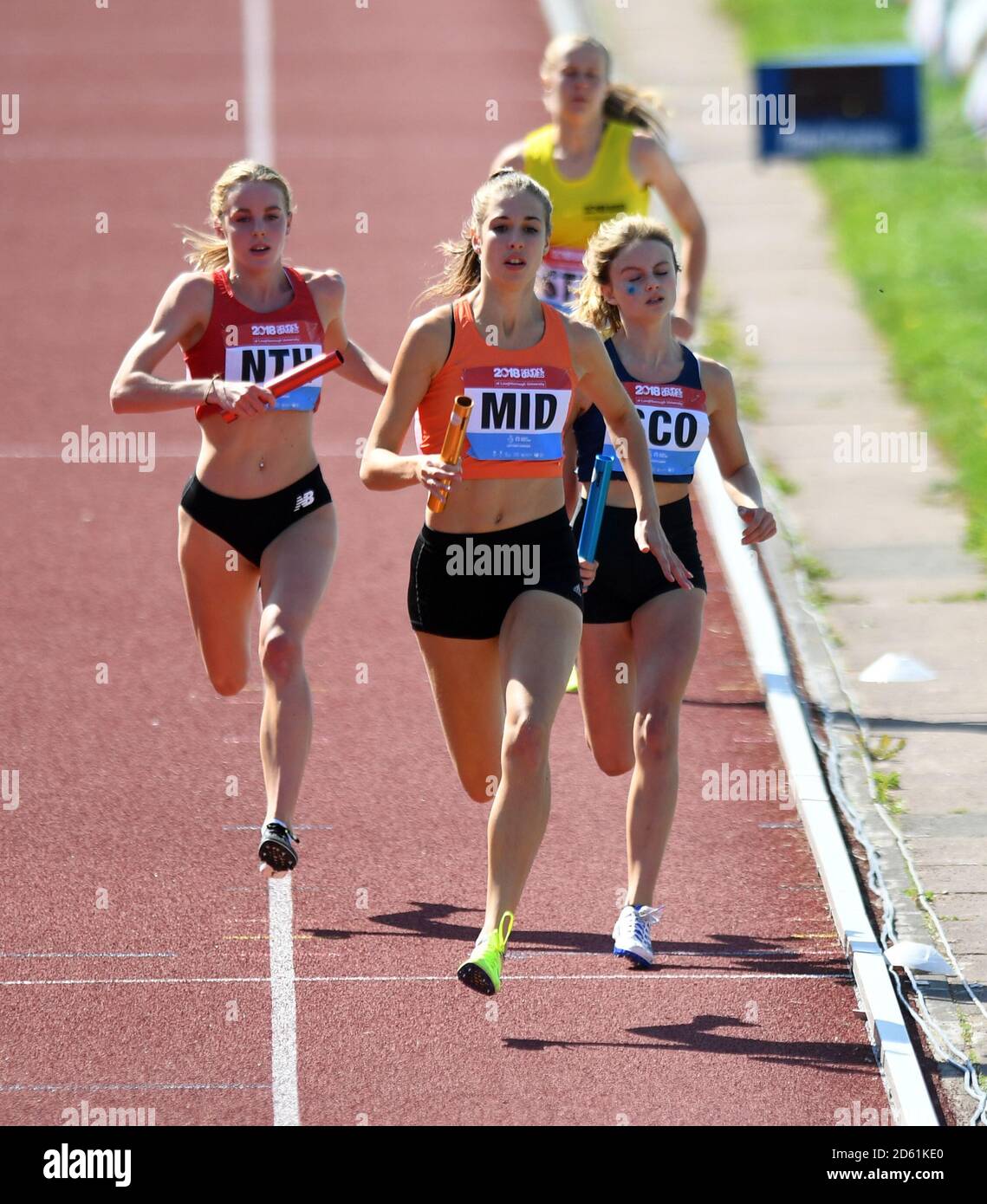 Competitors in the girls 4x300 relay during day two of the athletics at ...