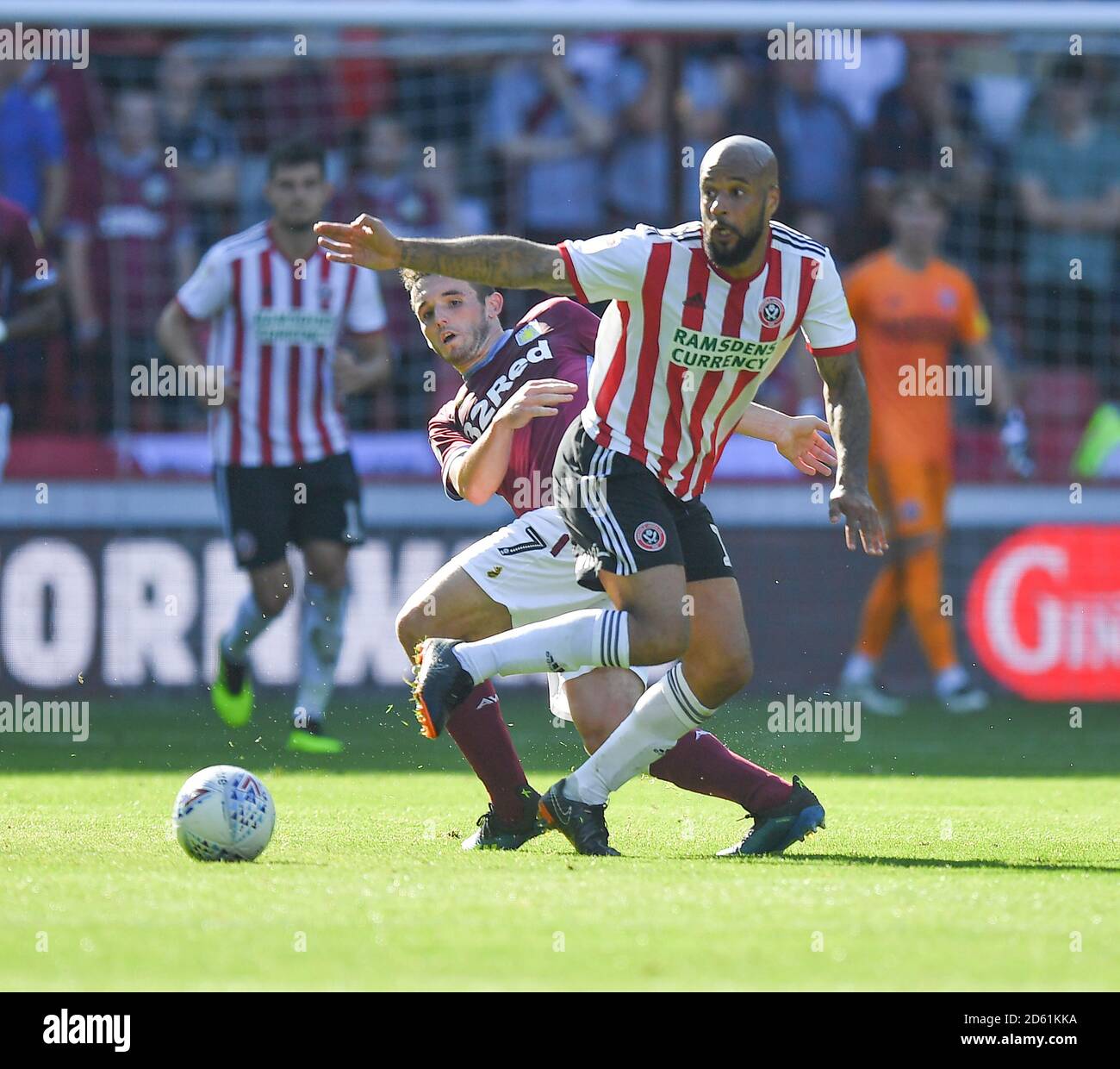 Sheffield United's David McGoldrick (right) battles with Aston Villa's ...