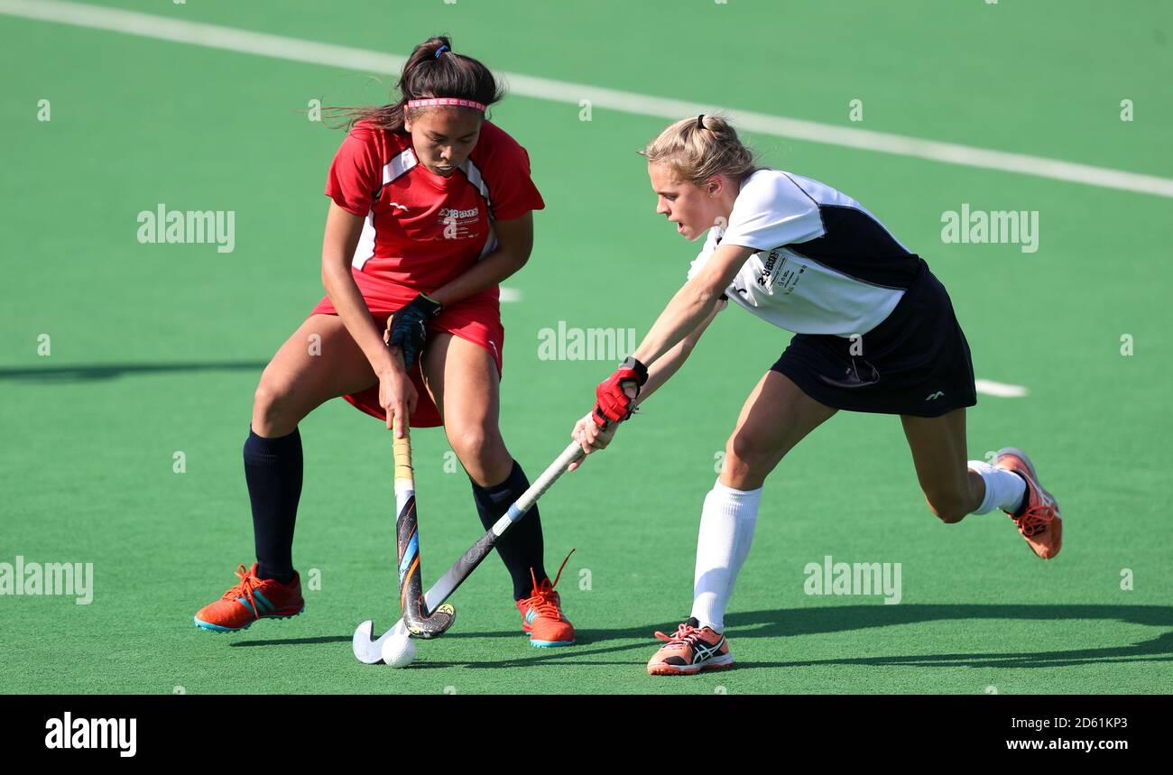 England Red's Kay Sheldon (left) and Scotland's Ellie MacKenzie during ...