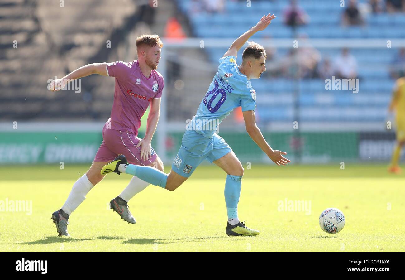 Coventry City's Tom Bayliss and Rochdale's Callum Camps (left Stock ...