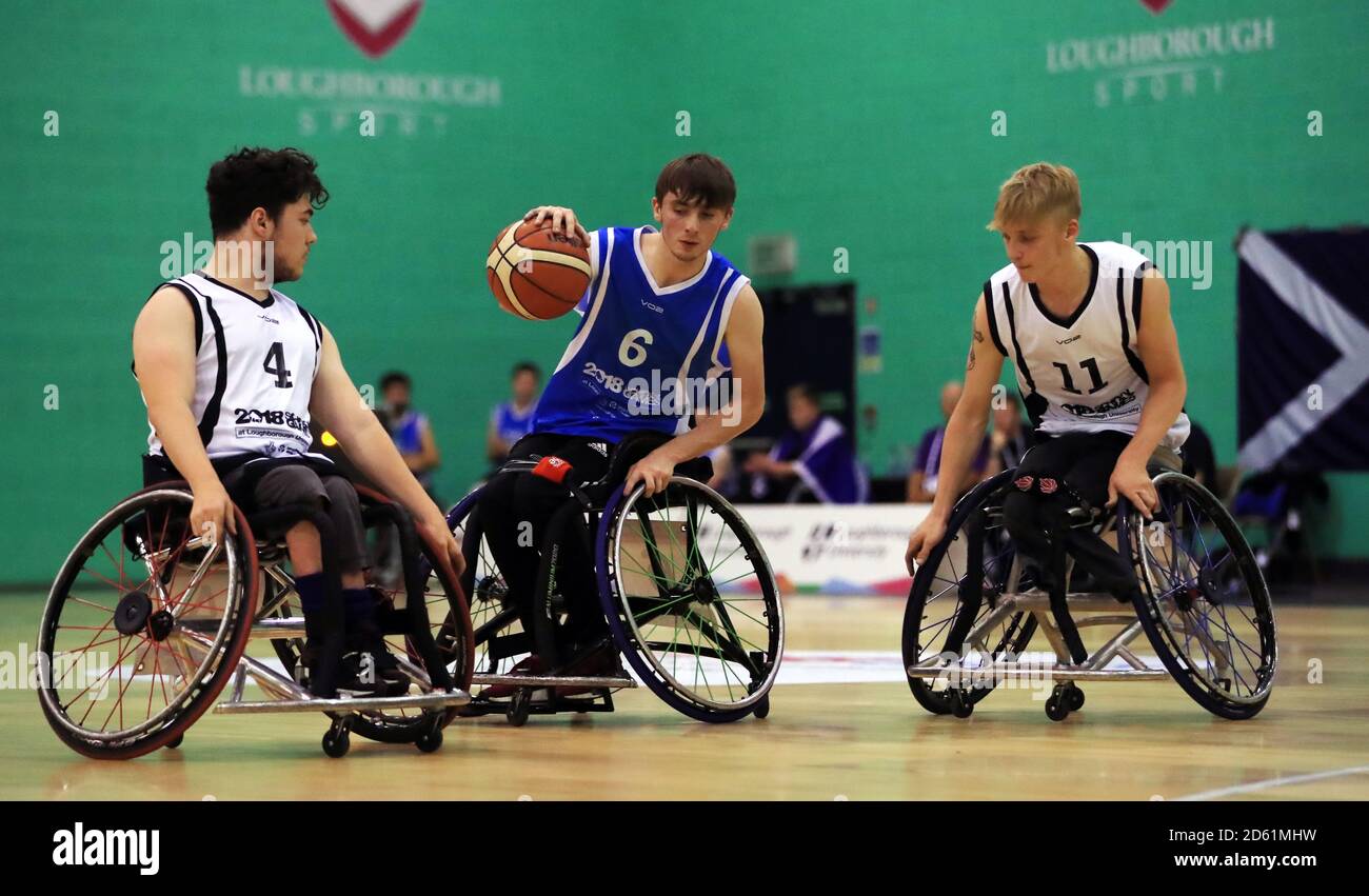 Scotland's James Beattie (centre) battles for the ball with England ...