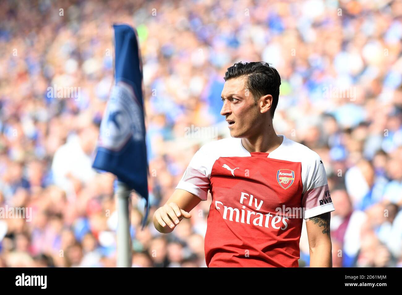 Arsenal's Mesut Ozil gestures before taking a corner kick Stock Photo ...