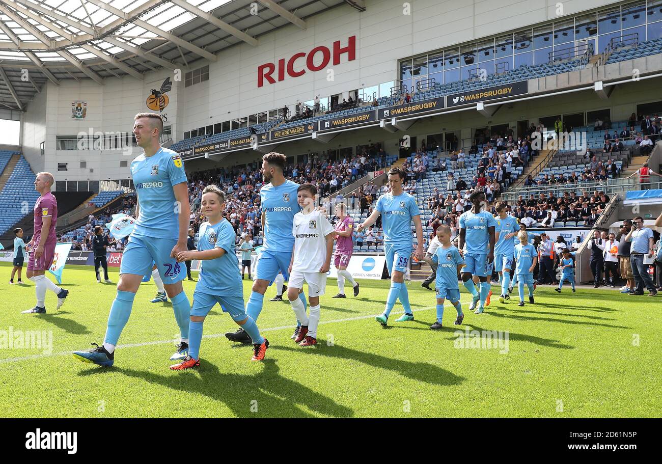 Coventry City walk onto the pitch prior to the match Stock Photo - Alamy