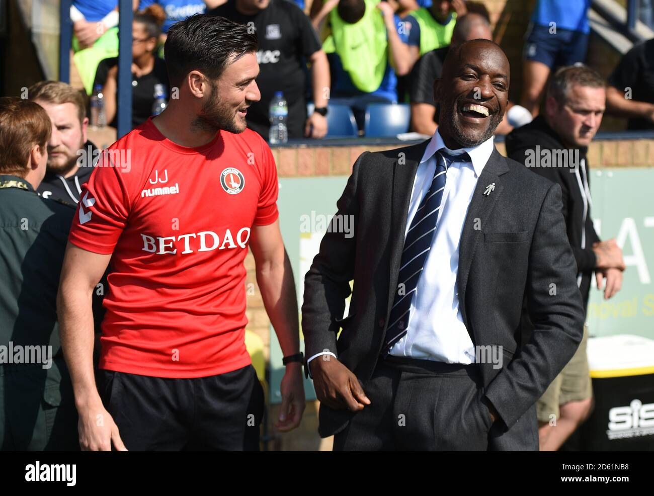 Charlton Athletic coach Jonnie Jackson (left) greets his former manager ...