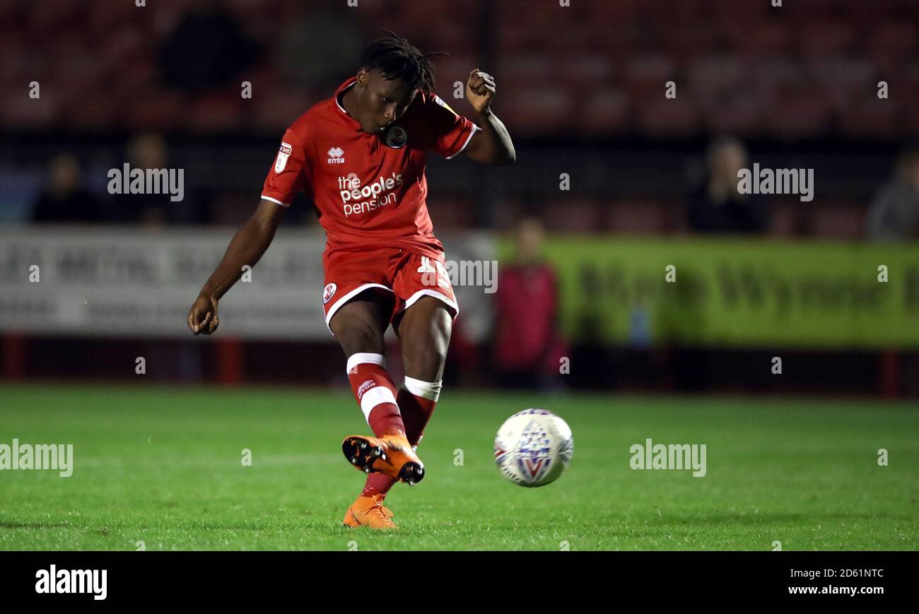 Crawley Town's David Sesay scores the winning penalty in the shoot out ...