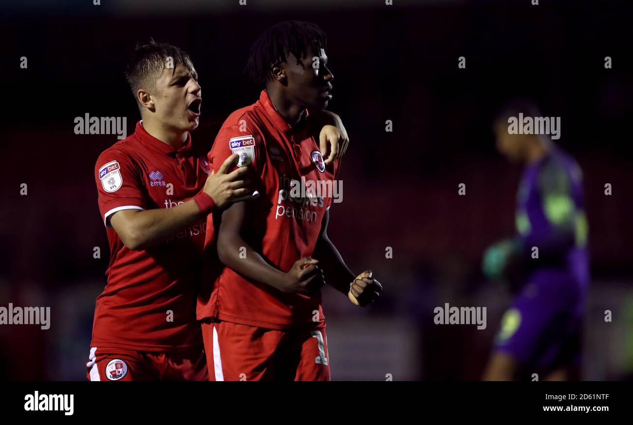 Crawley Towns David Sesay (centre and teammate Brian Galach, (left ...
