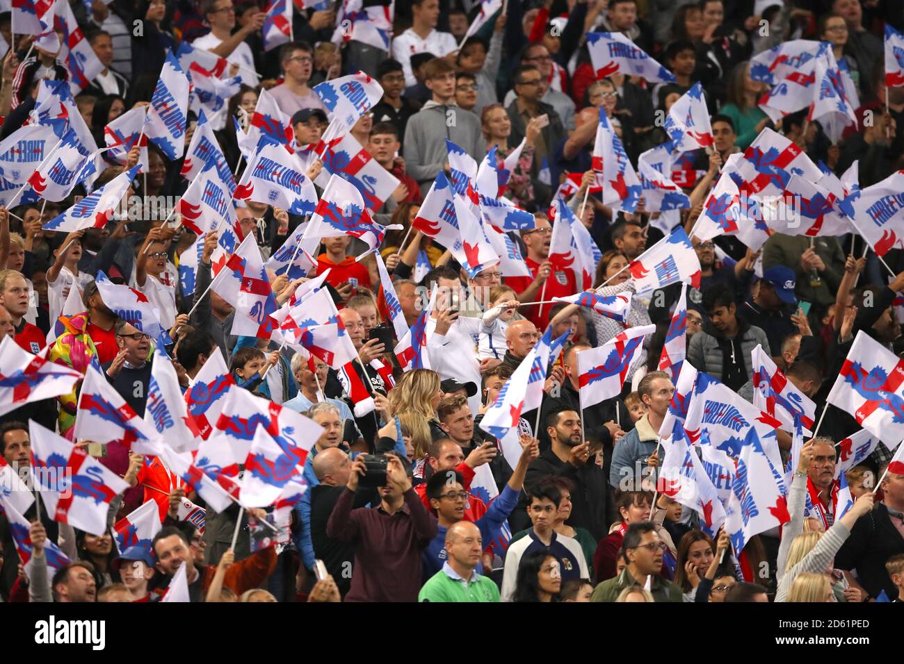 England fans wave their flags in the stands Stock Photo - Alamy