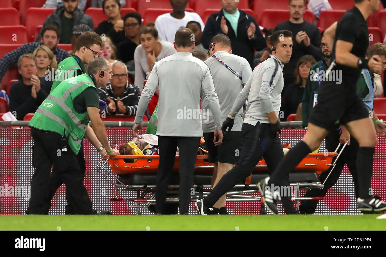 England's Luke Shaw is taken off the pitch on a stretcher by medical ... England's Luke Shaw is taken off the pitch on a stretcher by medical ...