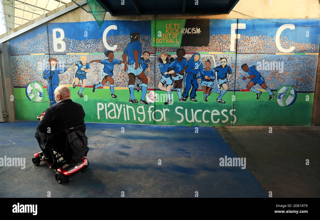 A 'Let's Kick Racism Out of Football' mural outside the ground before ...