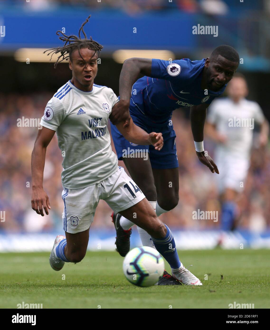 Cardiff City's Bobby Reid and Chelsea's Antonio Rudiger (right) battle ...