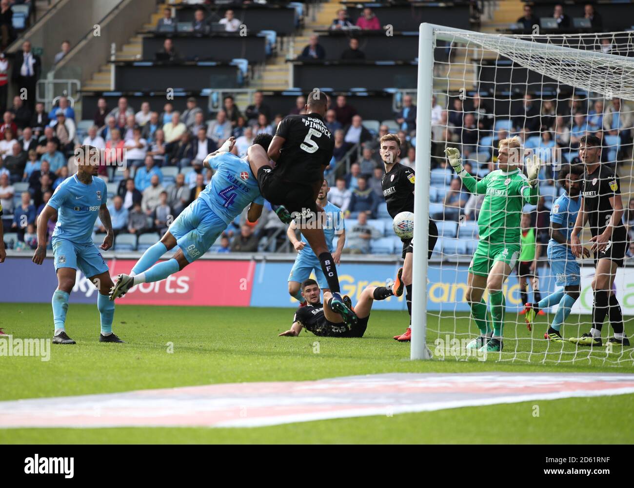 Coventry City's Jordan Willis (centre) scores his side's first goal of ...