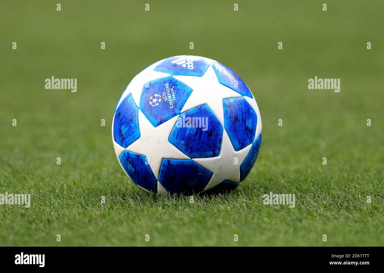 A detail view of a UEFA Champions League adidas football on the pitch ...