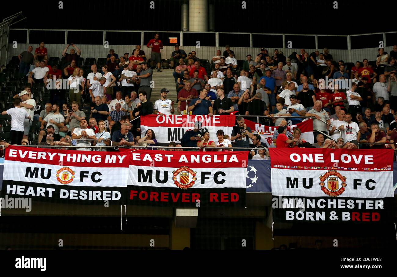Manchester united fans in the stands before the game hi-res stock ...
