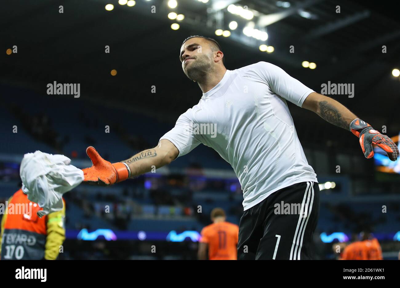Lyon goalkeeper Anthony Lopes throws his shirt into the crowd after the ...