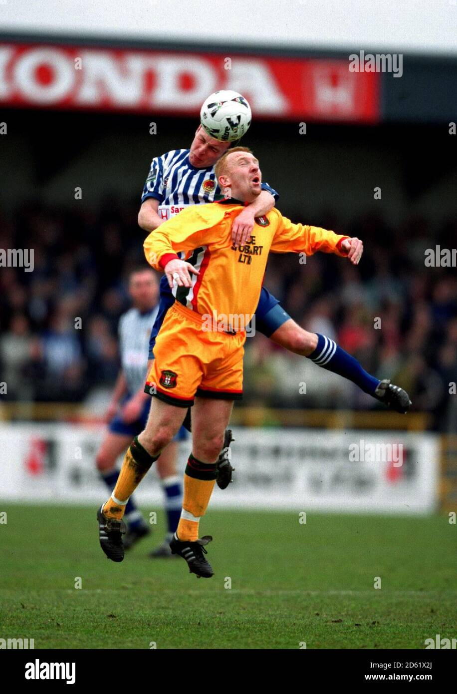 Chester City's Paul Carden (l) climbs above Carlisle United's Rob ...
