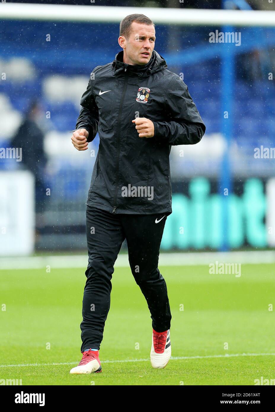 Coventry City's Michael Doyle warms up before kick off Stock Photo - Alamy