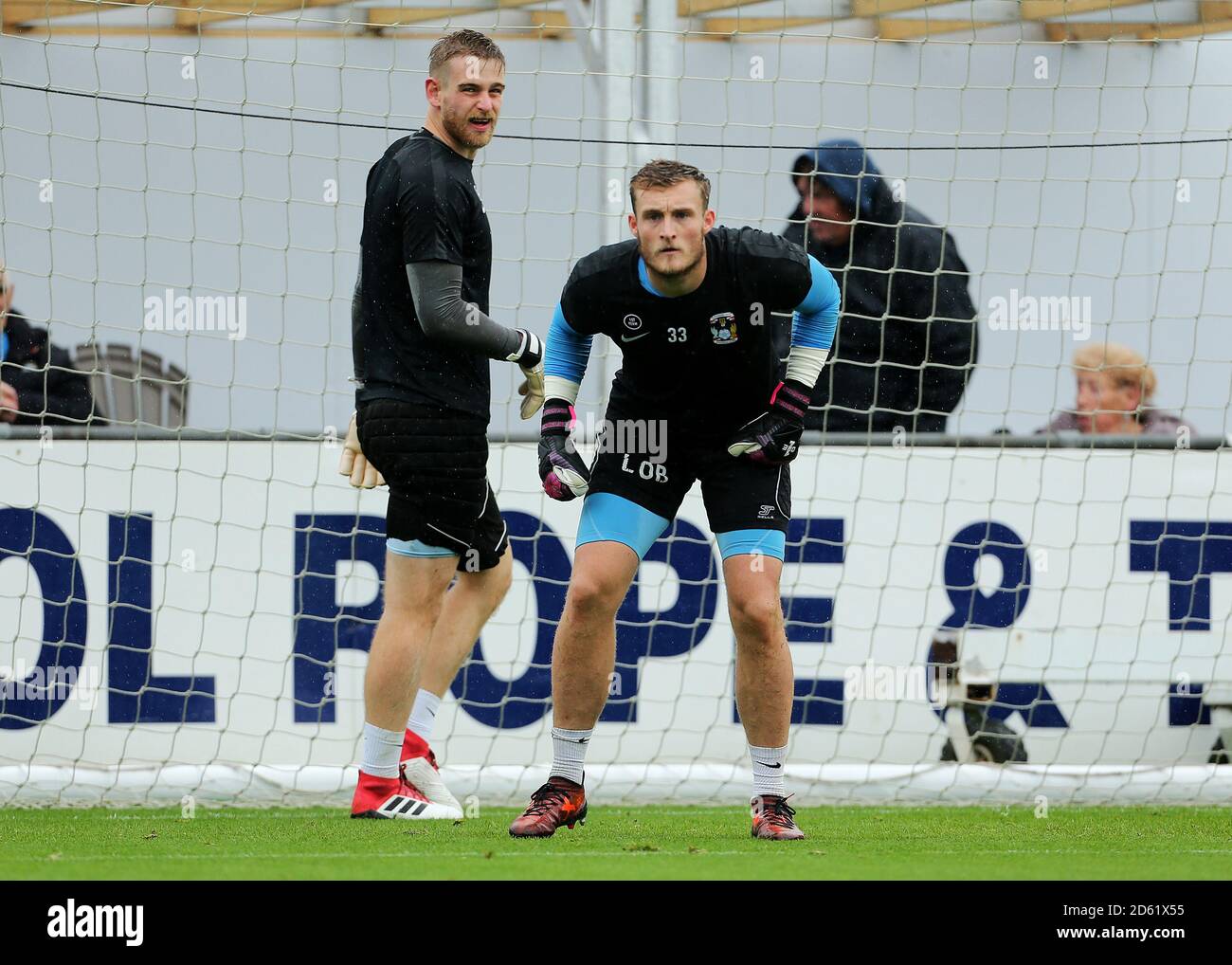 Coventry City goalkeepers Corey Addai and Lee Burge warm up before kick ...