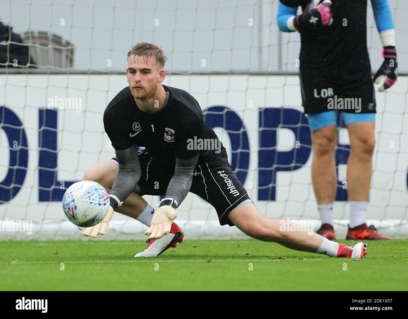 Coventry City goalkeeper Lee Burge warms up before kick off Stock Photo ...