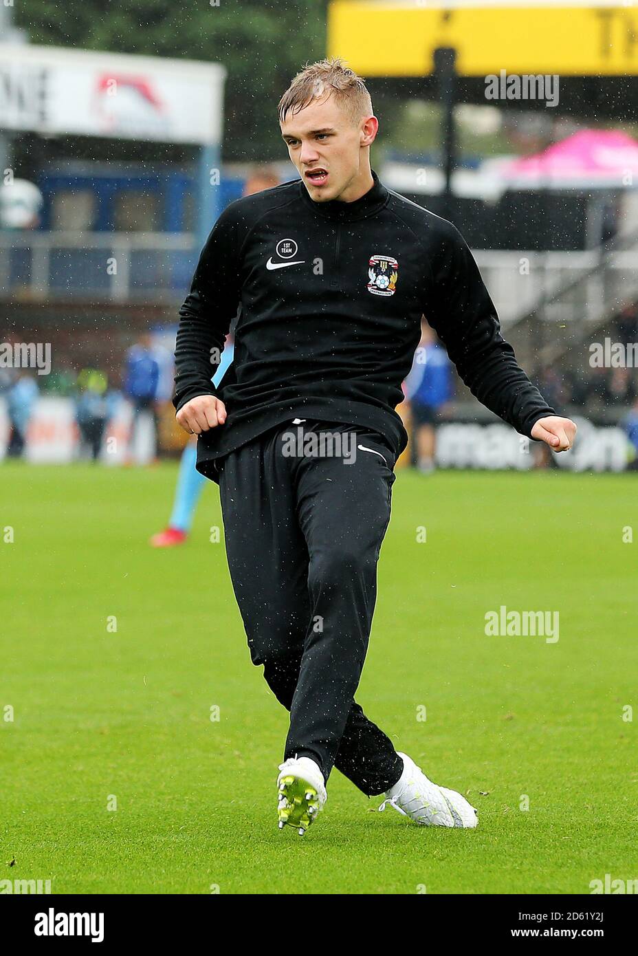 Coventry City's Luke Thomas warms up before kick off Stock Photo - Alamy