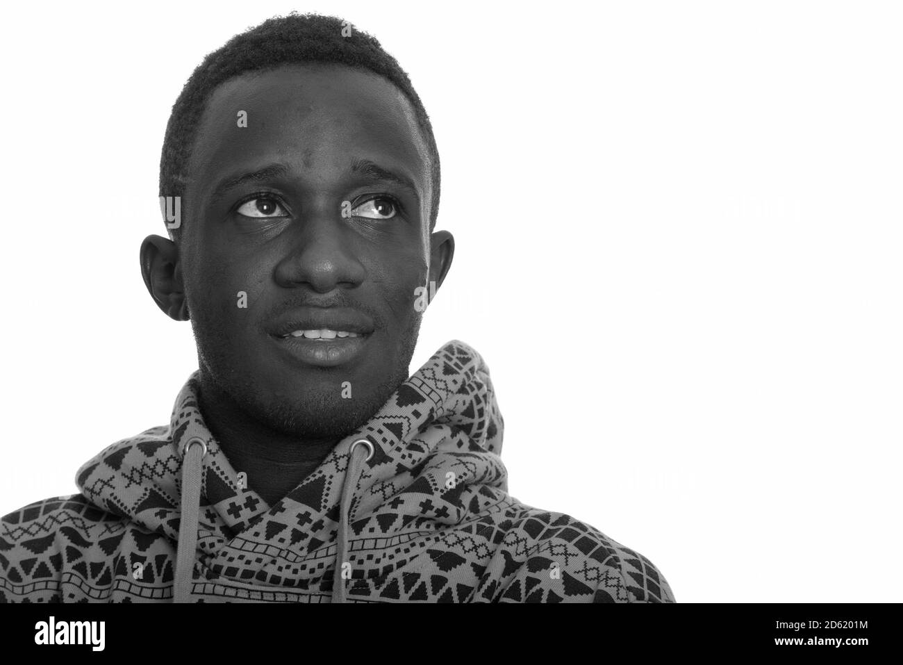 Young happy African man smiling while thinking Stock Photo - Alamy