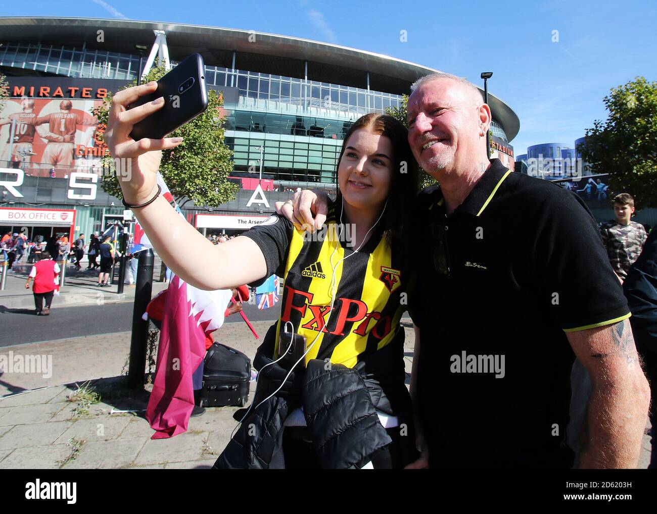 Watford fans take a selfie outside The Emirates Stadium Stock Photo - Alamy