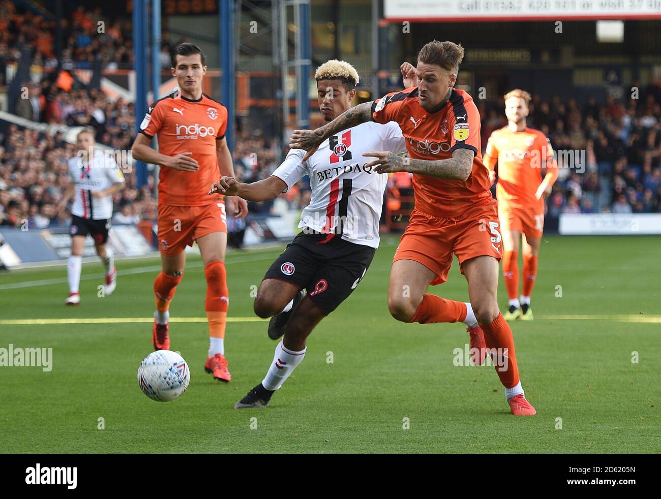 Charlton Athletic's Lyle Taylor and Luton Town's Sonny Bradley battle ...