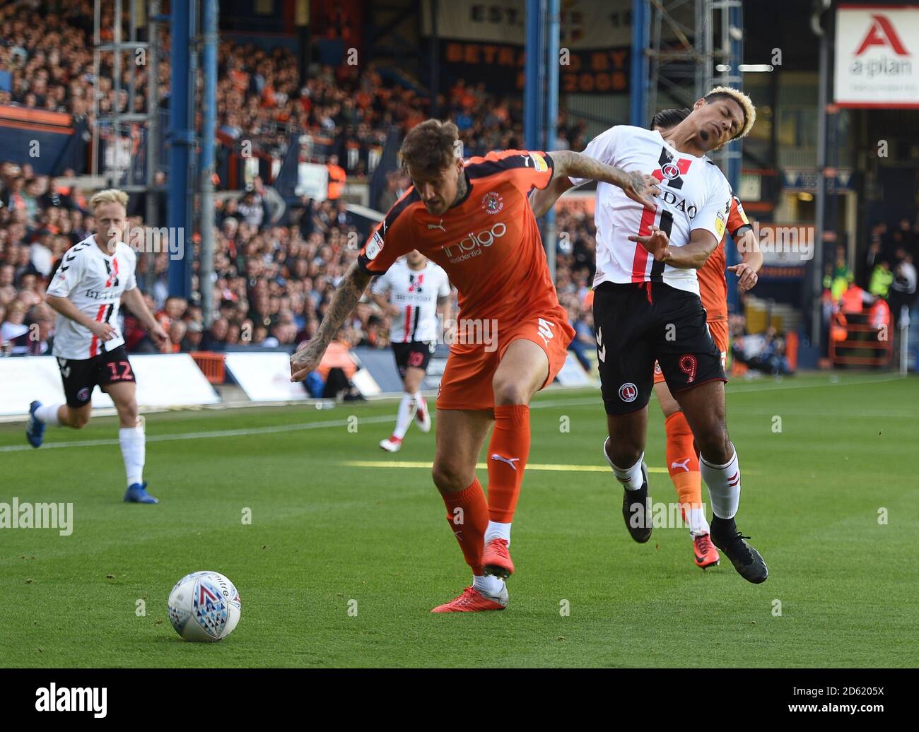 Charlton Athletic's Lyle Taylor and Luton Town's Sonny Bradley battle ...