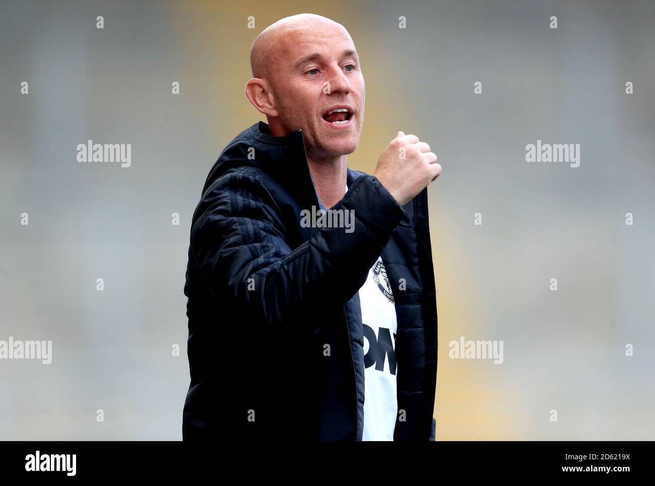 Manchester United Coach Nicky Butt gestures on the touchline Stock ...