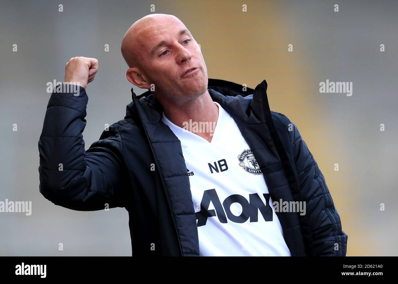 Manchester United Coach Nicky Butt gestures on the touchline Stock ...
