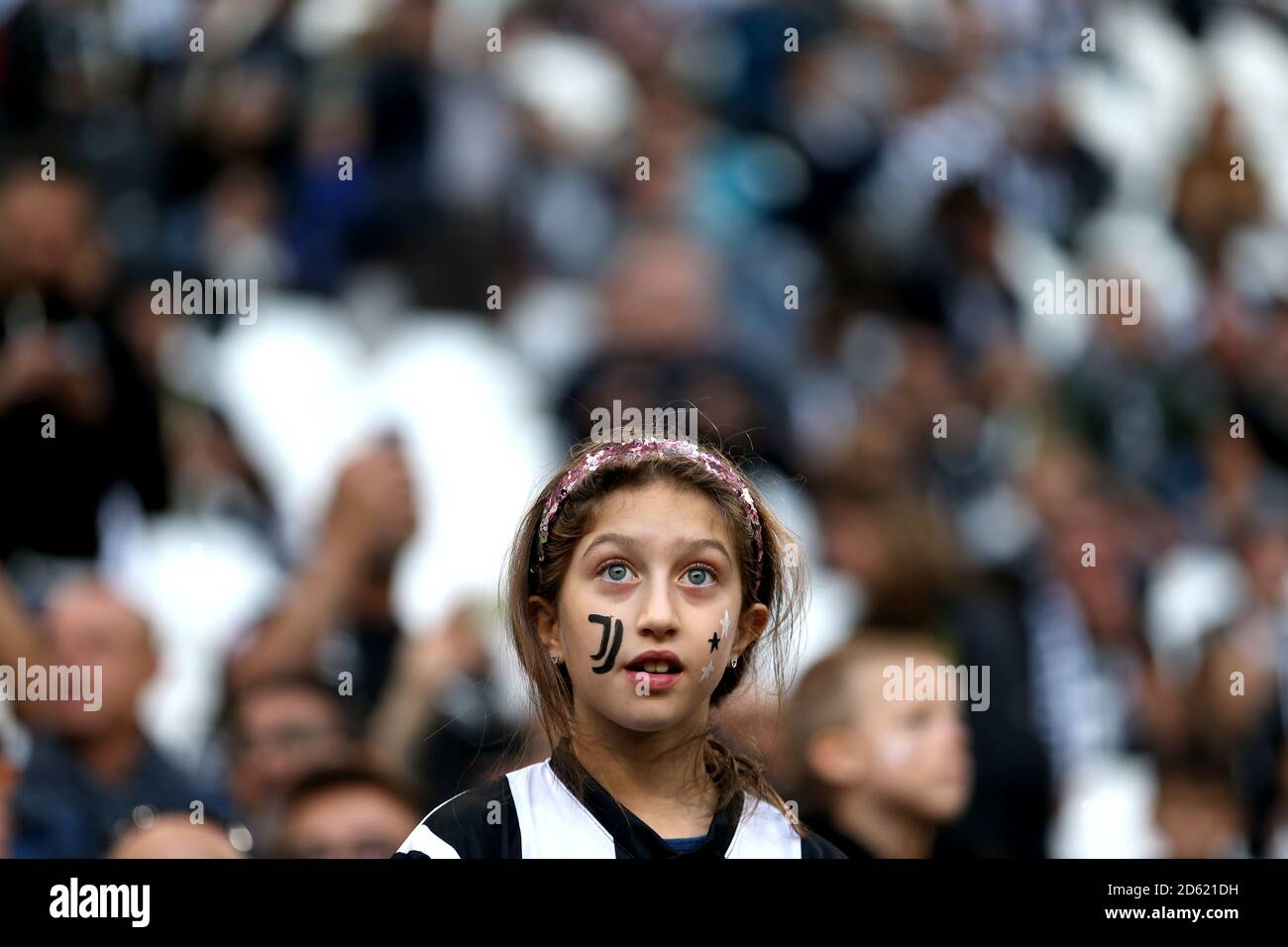 Juventus fans in the stands Stock Photo - Alamy