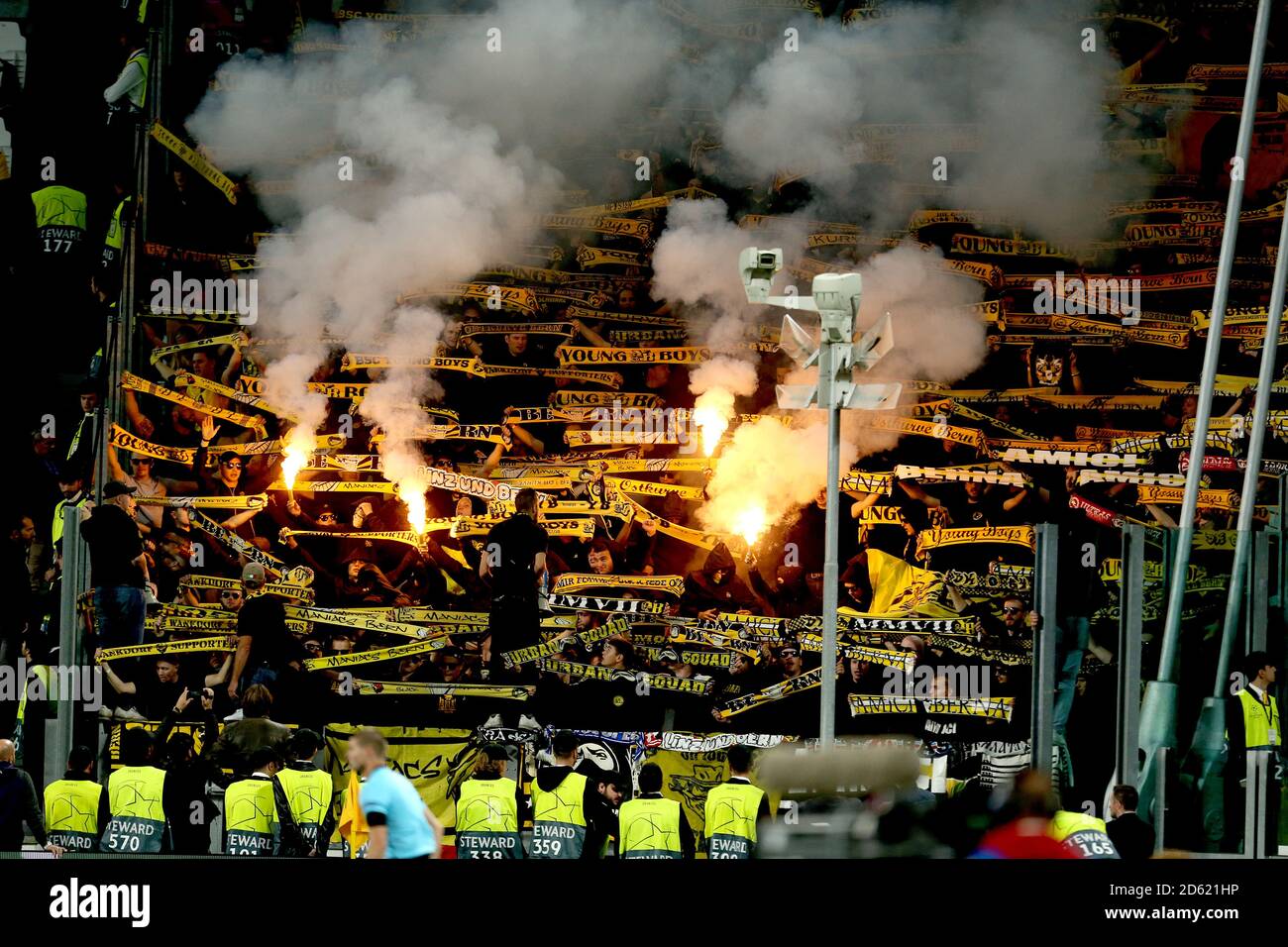 Young Boys fans let off flares in the stands Stock Photo - Alamy