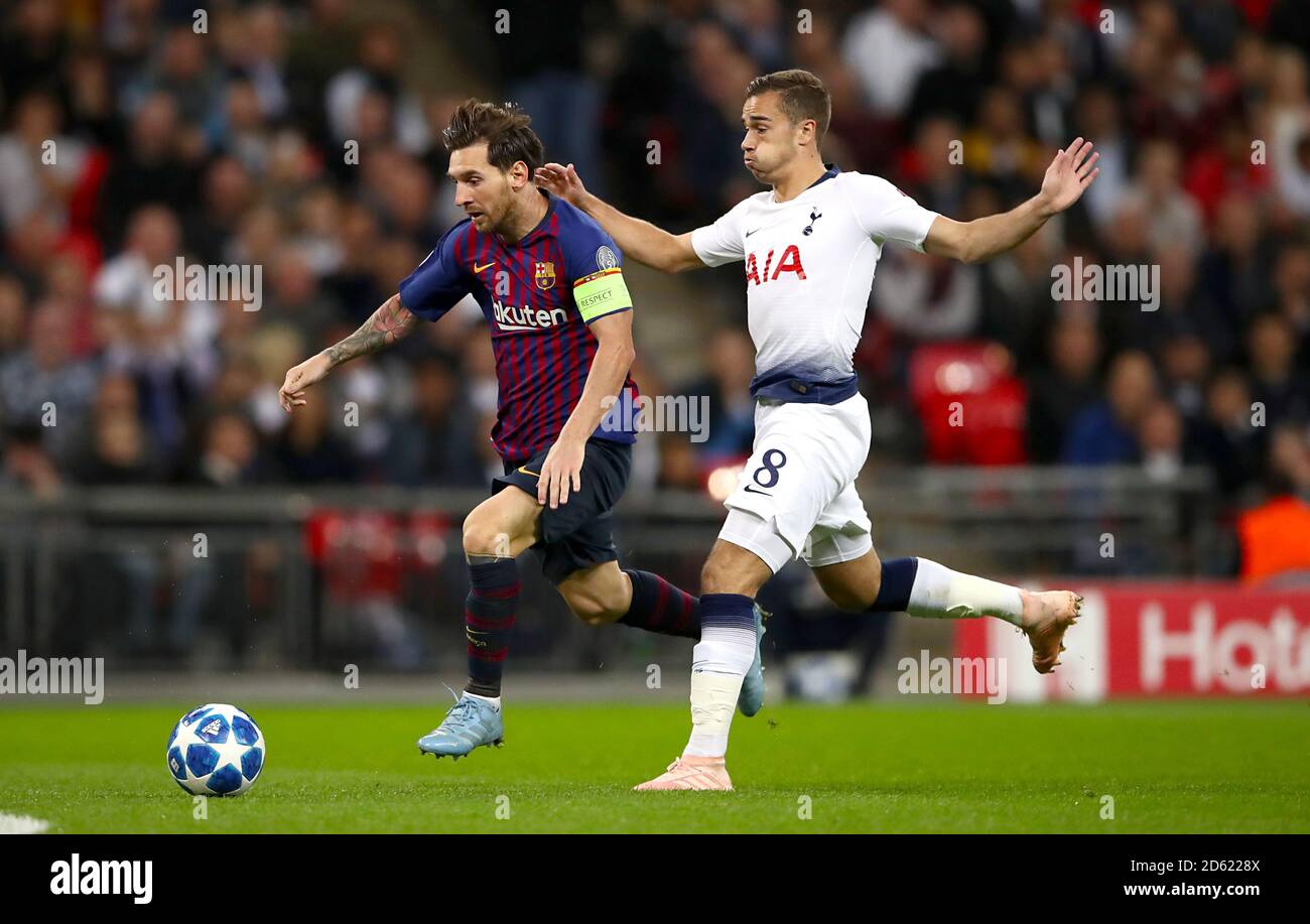 Barcelona's Lionel Messi (left) and Tottenham Hotspur's Harry Winks ...